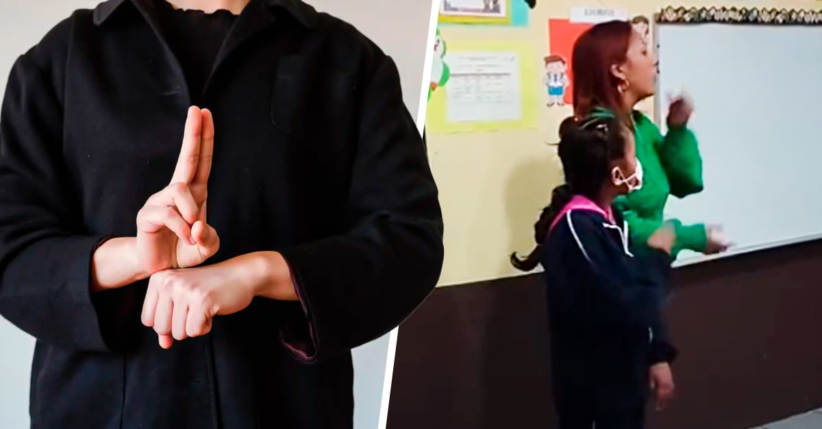 Maestra enseña lenguaje de señas a alumnos por una niña